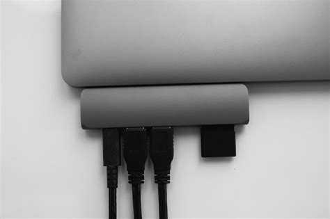 Premium Photo Laptop With Usb Typec Adapter With Pluged Usb Cables And Sd Card