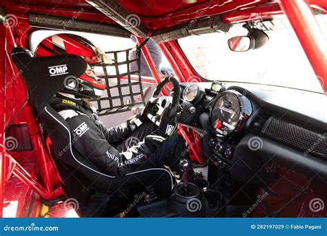 Touring Car Driver With Helmet And Suit Sitting In Cockpit Editorial