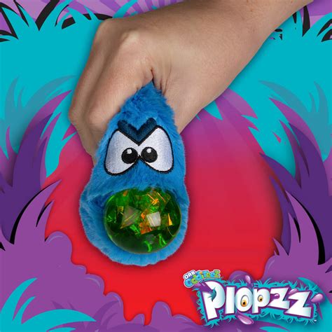 Squeeze Your Orb Odditeez™ Plopzz™ To Unleash A Bubble Of Sparkly Goo