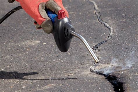 2026 Asphalt Repair Costs Patch Driveway Cracks And Potholes