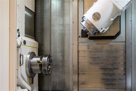 The High Technology Multi Tasking Cnc Machine Cutting The Metal Shaft