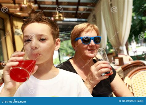 Grandson And Grandmother Drinking Juice Stock Image Image Of Care Grandson