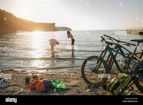 Men Bathing In Sea Water Stock Photo Alamy