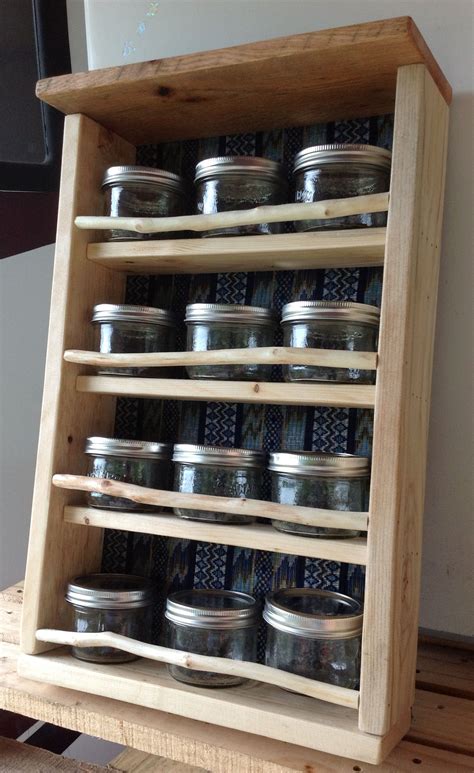 Mason Jar Spice Rack Made From A Pallet And Twigs Backed With Vintage