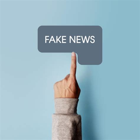 Premium Photo A Person Presses A Button With The Word Fake Creating