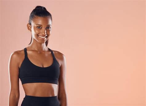 Premium Photo Fitness Happy And Healthy Female Athlete With A Smile