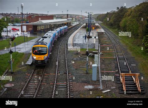 A First Transpennine Express Class 185 Train Departing From Barrow In Furness Railway Station In