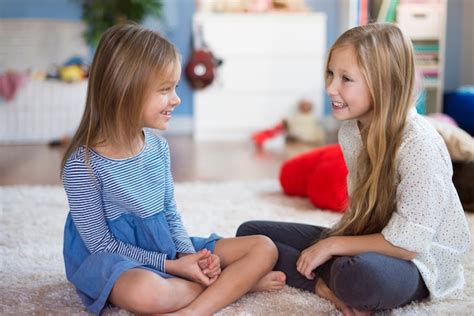 Free Photo Girls Talking To Each Other In The Living Room