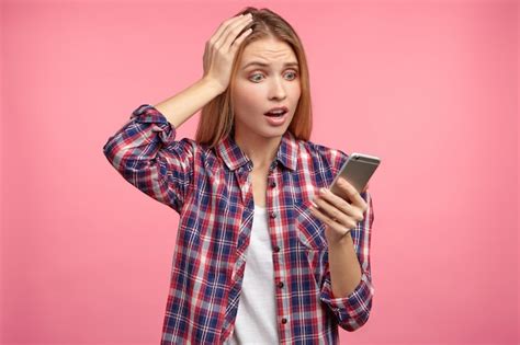 Free Photo Portrait Of Blonde Woman In Striped Shirt With Phone