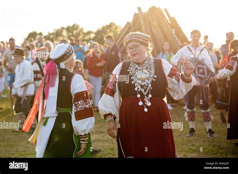 Locals In Traditional Seto Estonian Folk Clothing Dancing Celebrating