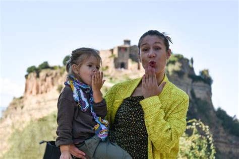 Premium Photo Portrait Of Mother And Daughter Against Sky