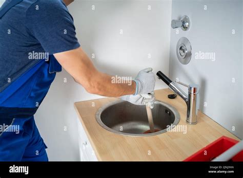 Unclog Blocked Sick Drain Plumber Cleaning Handyman Service Stock Photo Alamy