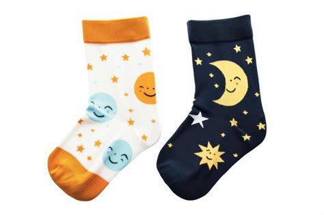 Premium Ai Image Two Pairs Of Socks With Faces And Stars