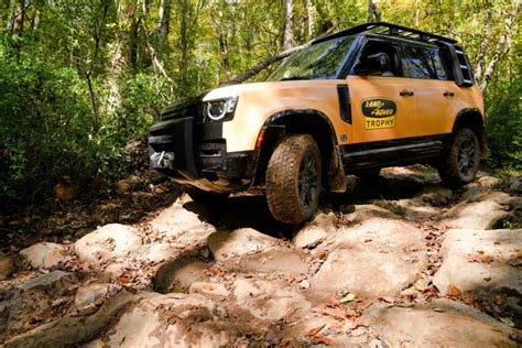 Racing Through Muddy Trenches Treacherous Trails And A Rat Trap Obstacle In The Land Rover