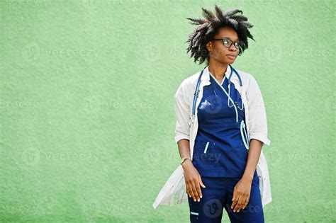 Portrait Of African American Female Doctor With Stethoscope Wearing Lab