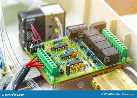 Integrated Semiconductor Microchip Microprocessor On Green Circuit Board Representative Of The