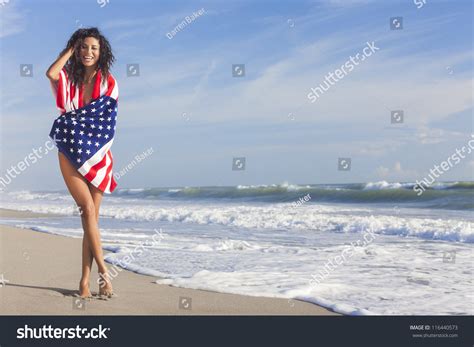 Beautiful Young Woman Laughing Wearing Bikini And Wrapped In American