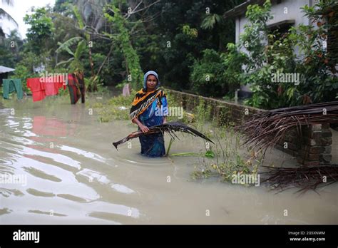 A Woman Is Seen Flooded Area In Munshiganj Near Dhaka Bangladesh On