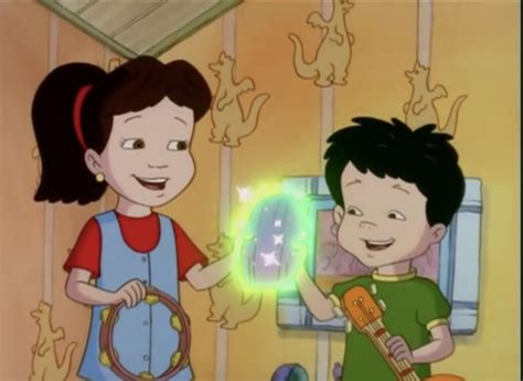 A Compilation Of Emmy And Max Holding The Dragon Scale