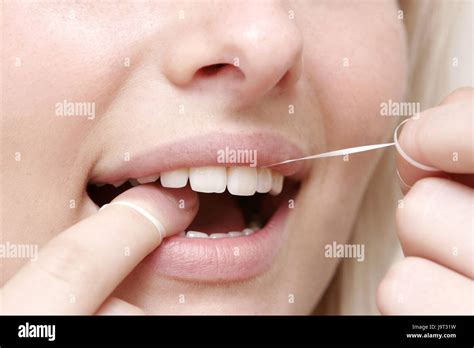 Woman Oral Hygiene Dental Floss Stock Photo Alamy