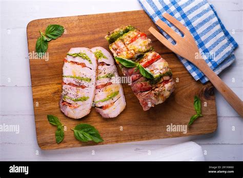 Italian Style Pork Loin Stuffed With Pesto Sauce Mozzarella And Tomato
