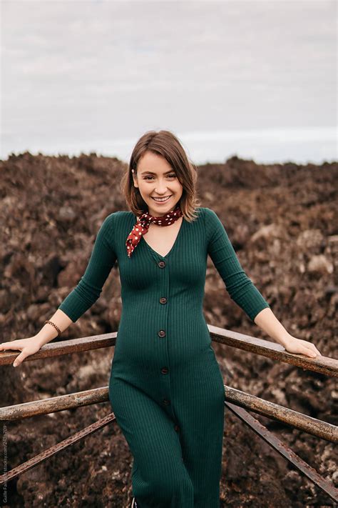Cheerful Pregnant Woman On Seashore By Stocksy Contributor Guille