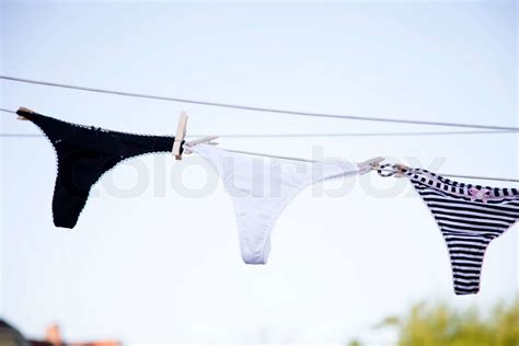 Underwear Hanging To Dry In A Clothesline Stock Image Colourbox