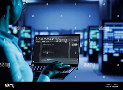 It Developer Running Code And Programming On Laptop Troubleshooting And Upgrading High Tech