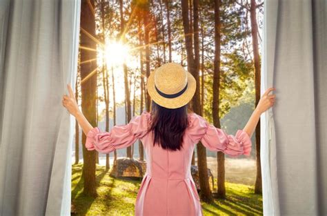 Premium Photo Asian Woman Traveller Open Curtain Of Hotel Room For