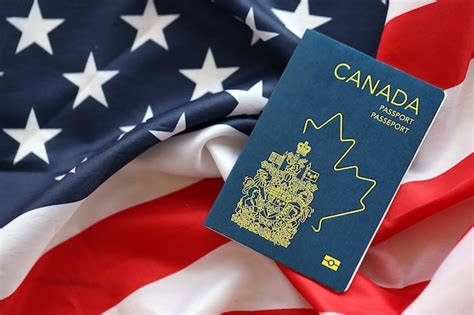 Premium Photo Canadian Passport On United States National Flag