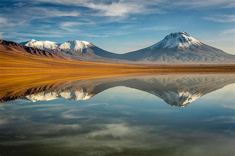 Tranquil Lake Lejia Reflecting Stunning Volcanic Landscape In Chiles