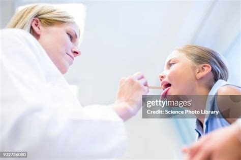 Girl Tongue Doctor Photos And Premium High Res Pictures Getty Images