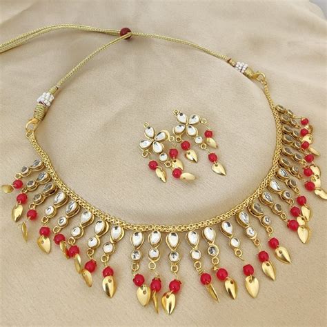 Gold Finish Jardhu Jadau Punjabi Traditional Pippal Patti Choker Tika Set In Traditional