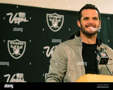 Las Vegas Raiders Quarterback Derek Carr Smiles While Responding To A