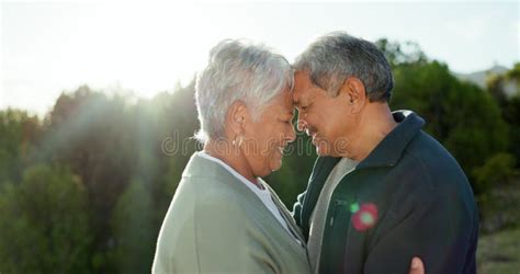 Outdoor Marriage And Senior Couple With Love Hug And Retirement With