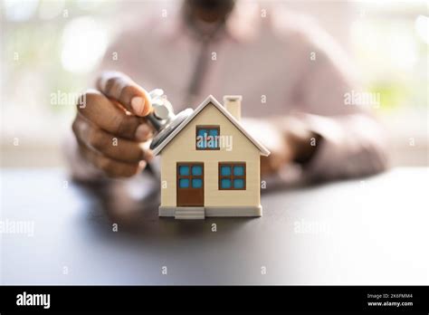 Doctor Doing Homecare Inspection House Property Check Stock Photo Alamy