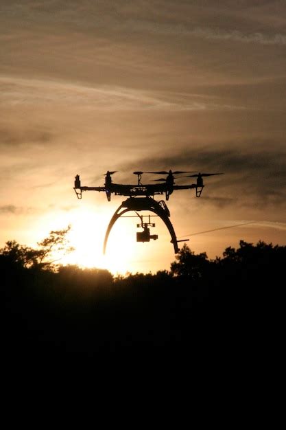 Premium Photo Silhouette Of Camera Against Sunset Sky