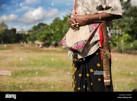 indonesia flores an elder man rufus goa having a smoke in kampung