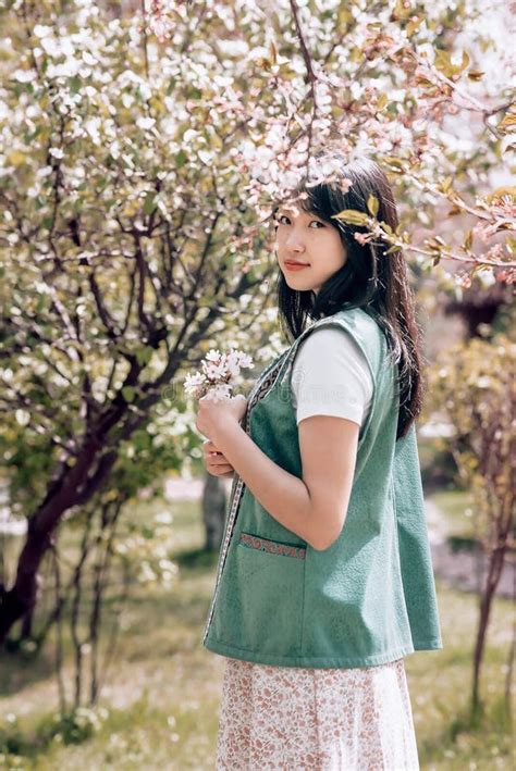Young Girl In Ethnic Traditional National Kazakh Costume In Spring