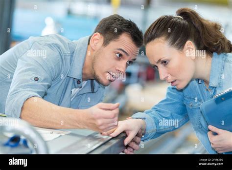 Male And Female Manual Workers In Industry Stock Photo Alamy