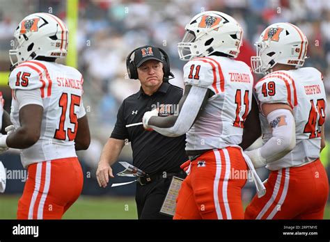 Mercer Head Coach Drew Cronic Talks To Players During The First Half Of An Ncaa College Football