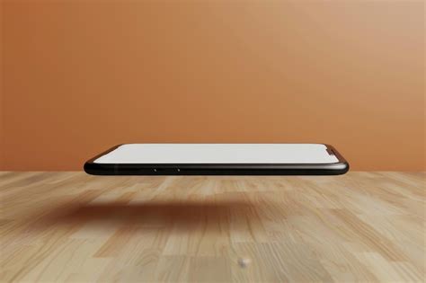 premium photo a phone is floating in midair on a wooden table