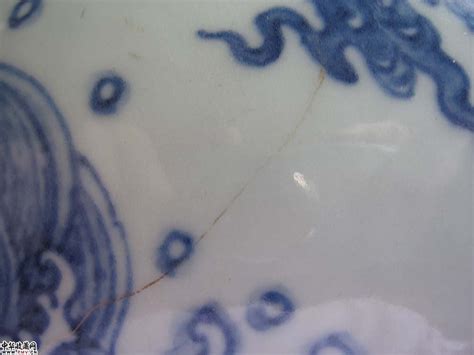 清乾隆青花釉里红海水云龙纹宝月瓶 藏家展厅 收藏资讯艺术家书画家书画名人书法家 中华收藏网