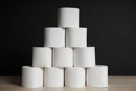 Many Toilet Paper Rolls Stacked In Pyramid Shape Soft Hygienic Paper