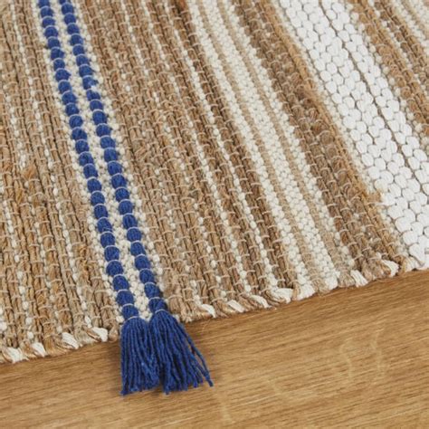 Alfombra de pasillo de yute y algodón reciclado tejidos con motivos decorativos en beige y azul