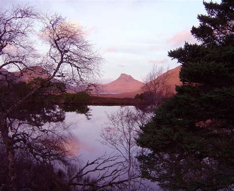Stac Pollaidh Known As Stac Polly In English Seen Across A Loch