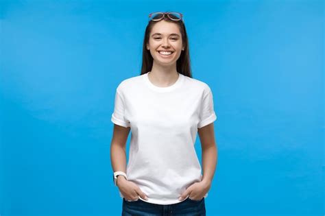 Premium Photo Young Smiling Female Wearing White Tshirt Isolated On