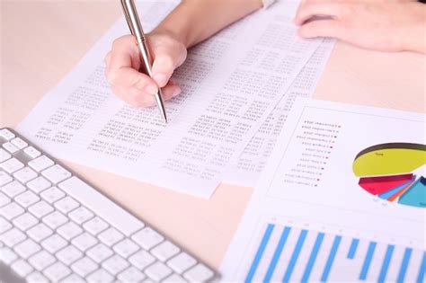Premium Photo Picture Of Woman Hand Writing On Paper With Numbers