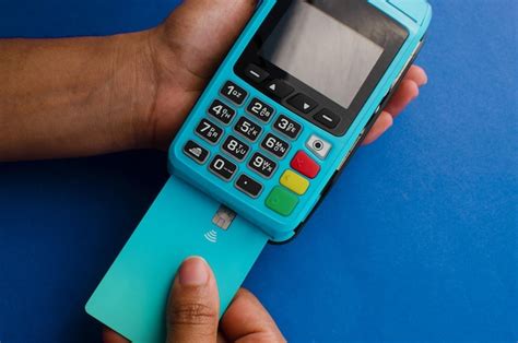 Premium Photo Closeup Of Hands Holding A Modern Credit Card Payment