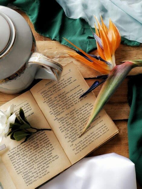 Flat Lay Woth Ond Boof And Flowers Premium Photo